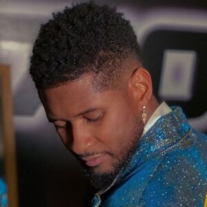 Usher Haircut - Best Black Men's Hairstyles South of France Style